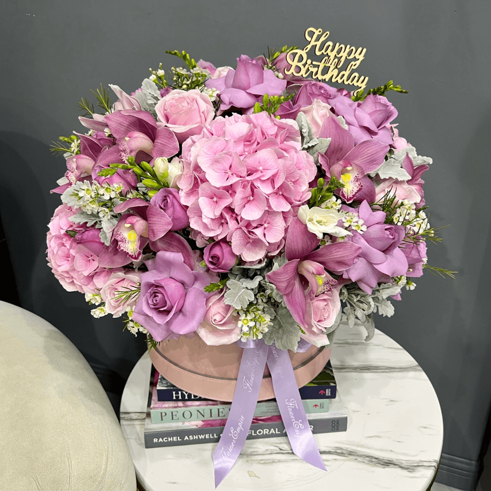 Beautiful mix of premium quality flowers arranged in a stylish flower box.
