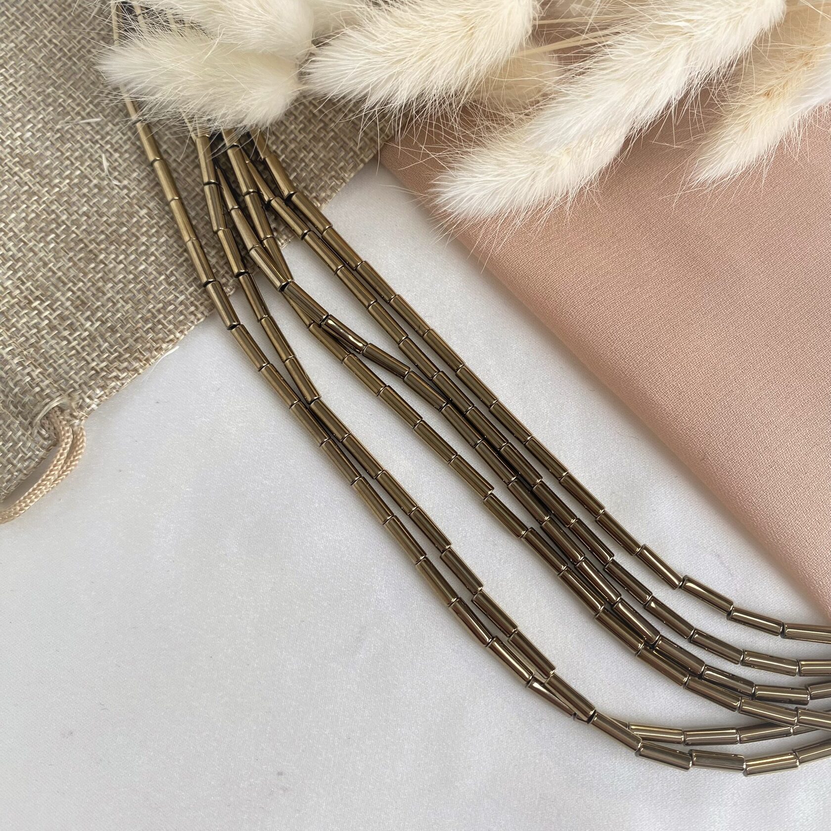 Гематит трубочка круглая, золотая (бронза), 9х3 мм , нитка 40 см