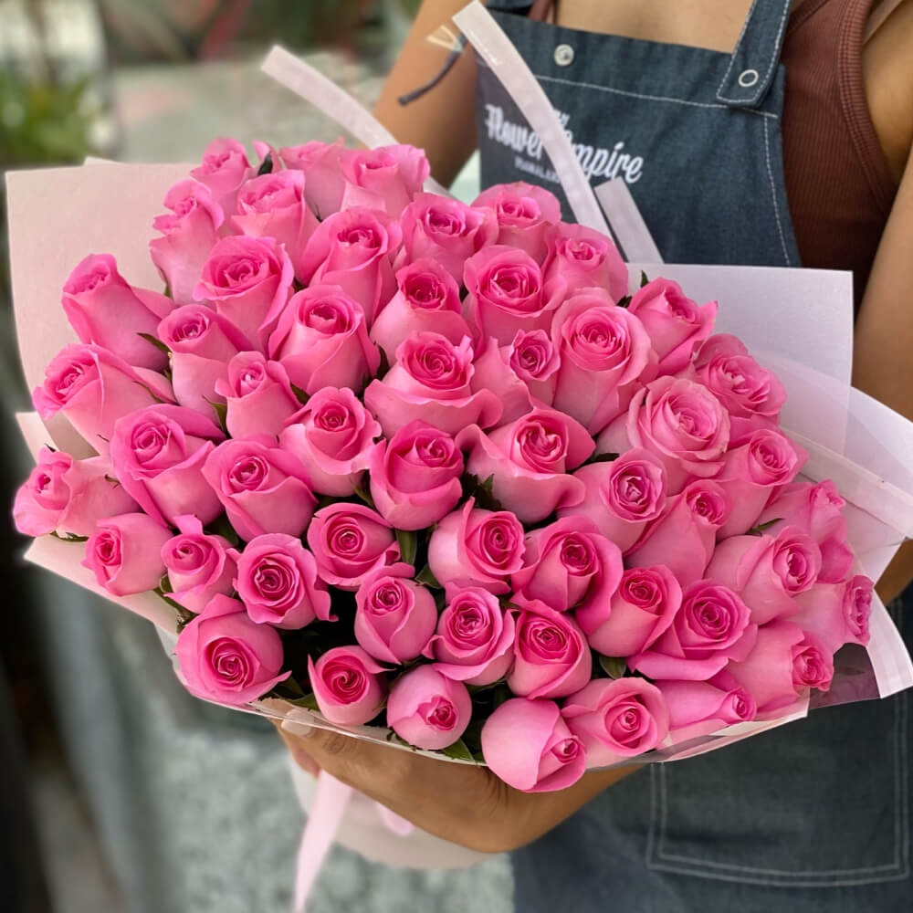 Beautiful bouquet of premium roses arranged in our signature style.