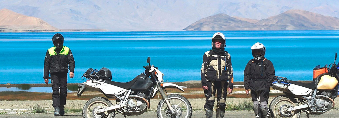Motorcycle tour along the mountain roads of Pamir and Tien Shan.