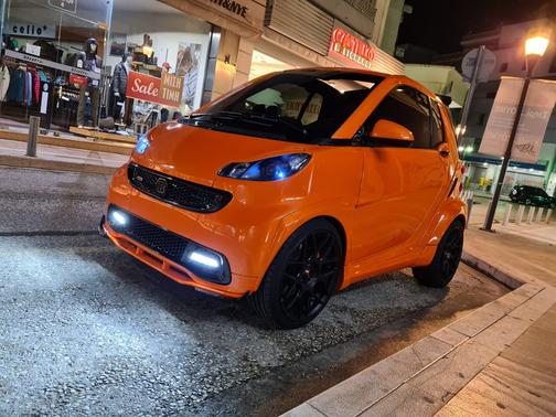 Smart Fortwo 451 with body kit orange full brabus