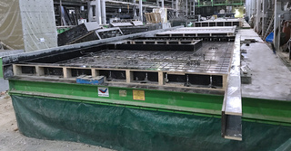 Tilting tables in operation