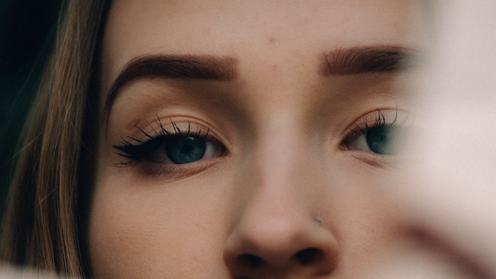Wide Nasal Bridge: Understanding Its Causes and How Rhinoplasty Can Help