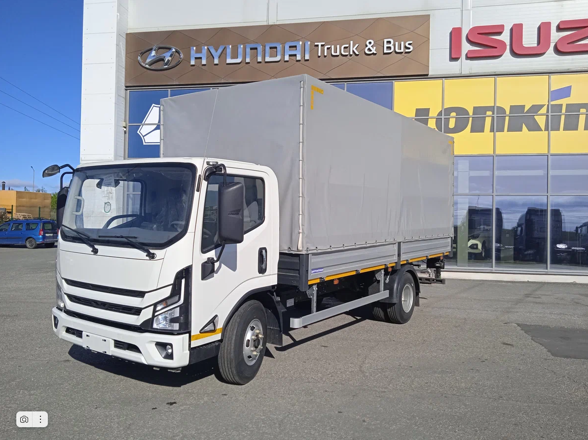 Ambertruck JM 93 с бортовой платформой тентом и воротами